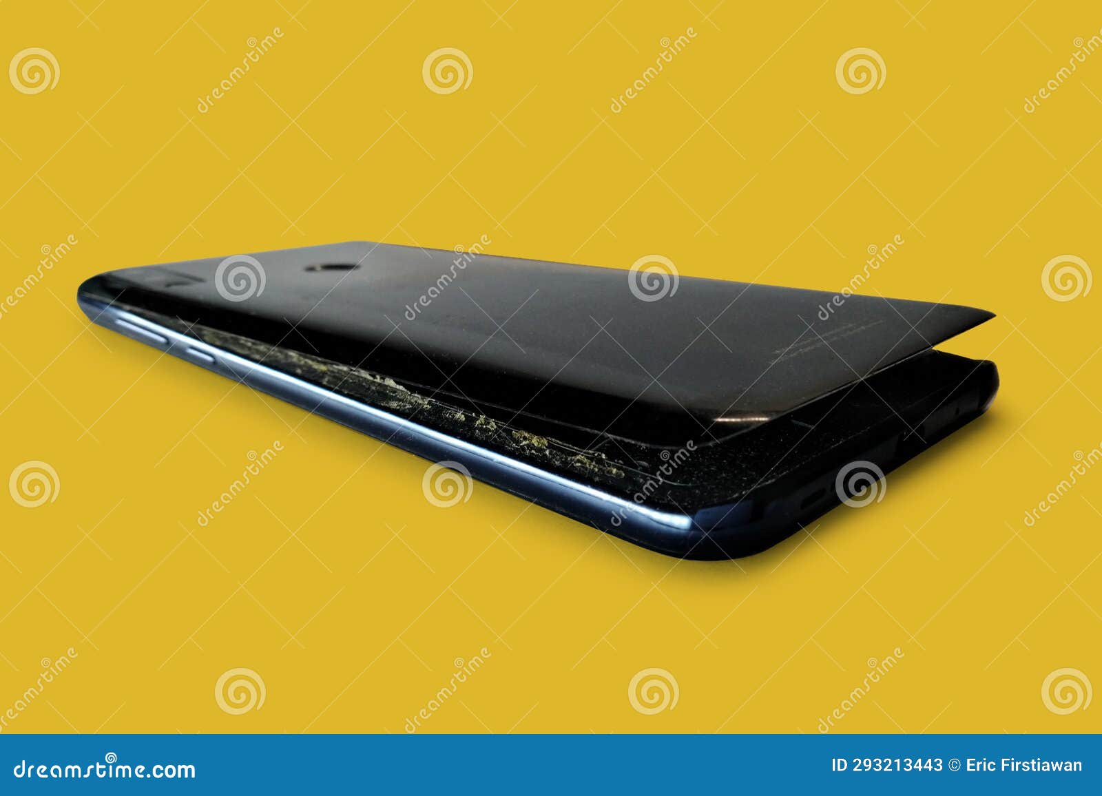 Broken Black Smartphone, Back Side Swollen Isolated in Yellow ...