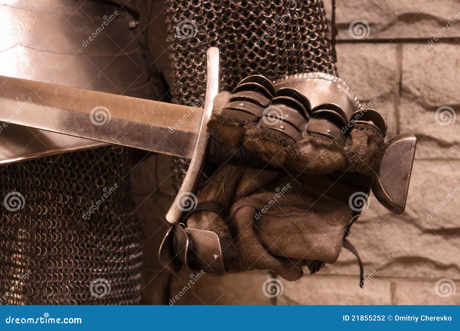 Sword in a hand of knight stock photo. Image of guard - 21855252