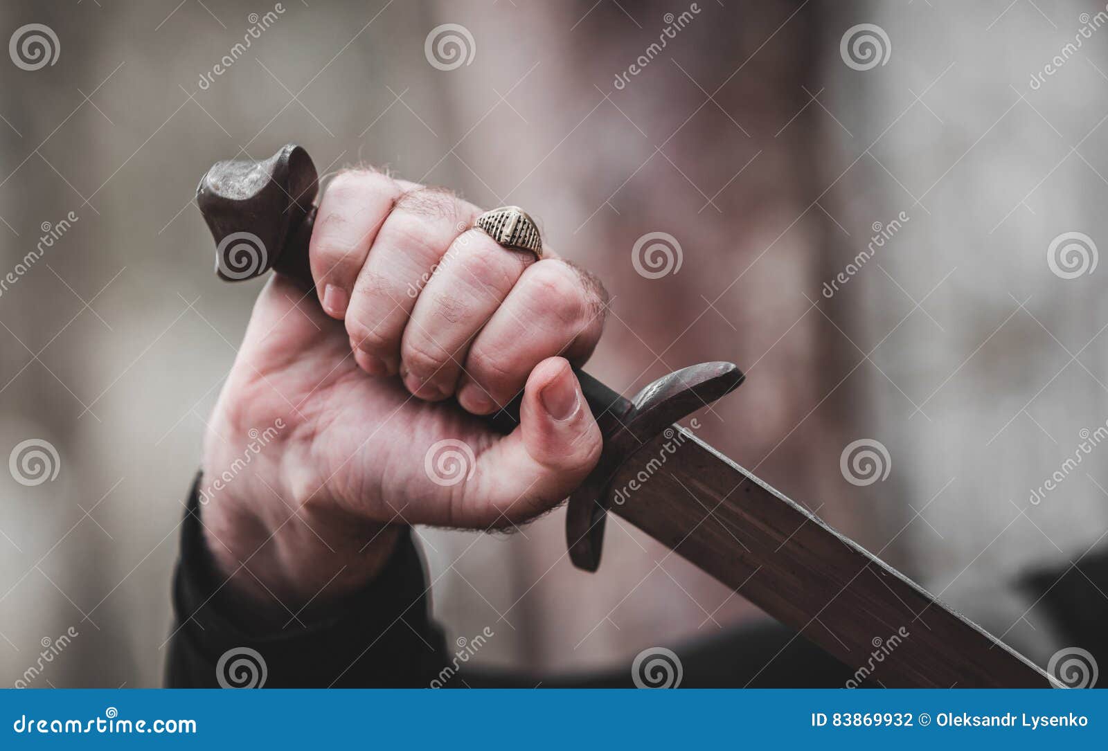 Sword in the man`s hand stock photo. Image of metal, ancient - 83869932