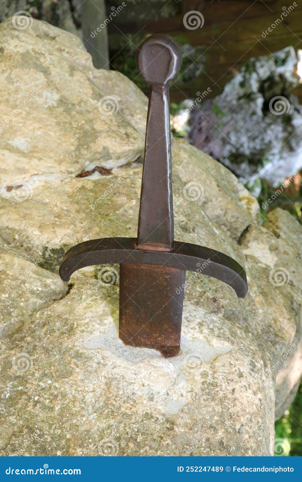 Sword Set in the Stone in the Middle of the Forest of Trees Symb Stock ...