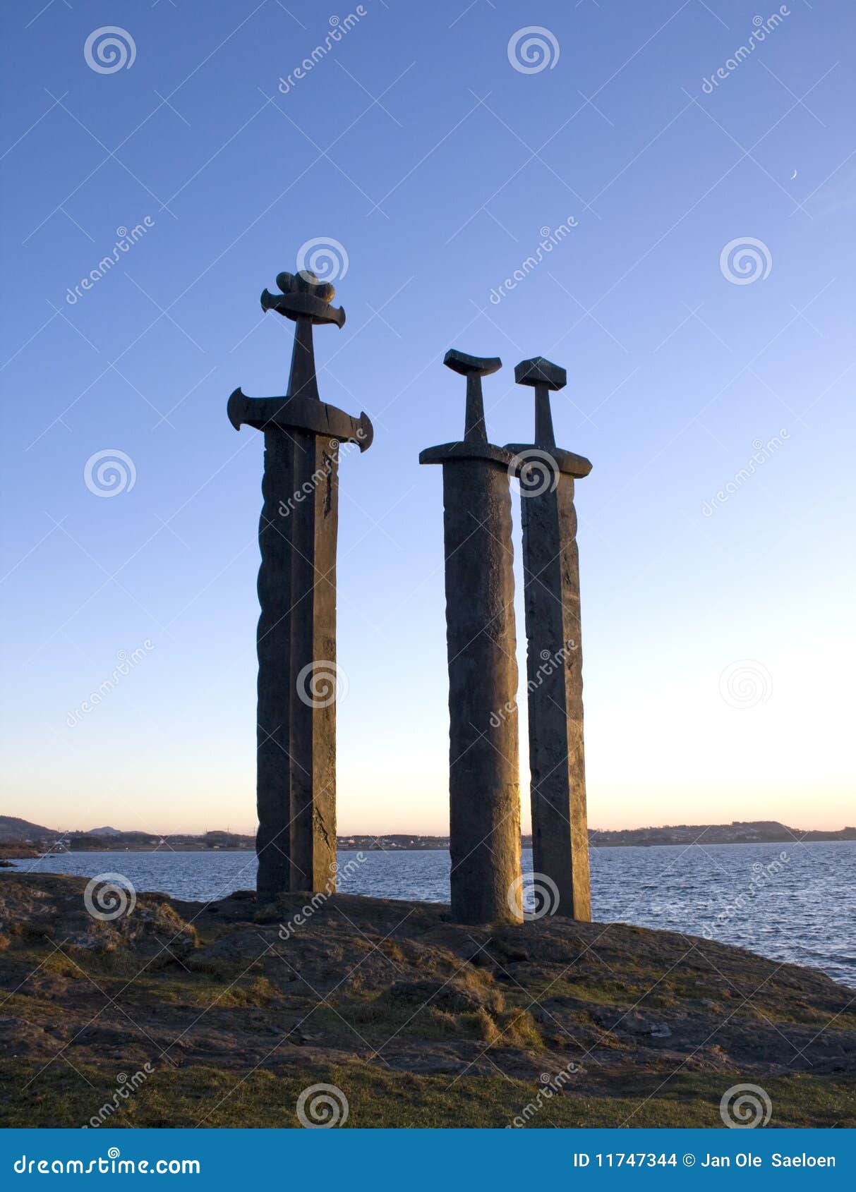 Swords in Rock stock photo. Image of bronze, lights, monument - 11747344