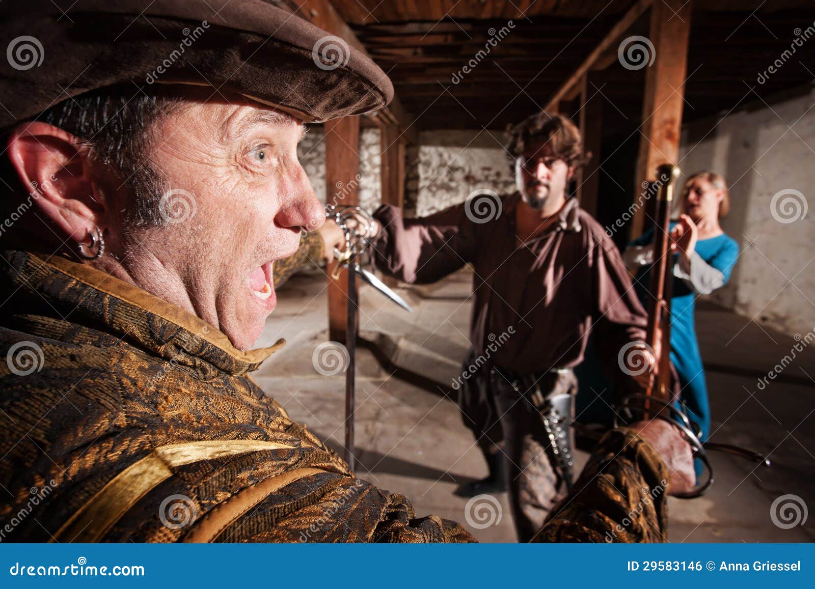 Swordsman Attacking Man and Woman Stock Photo - Image of arts, damsel ...