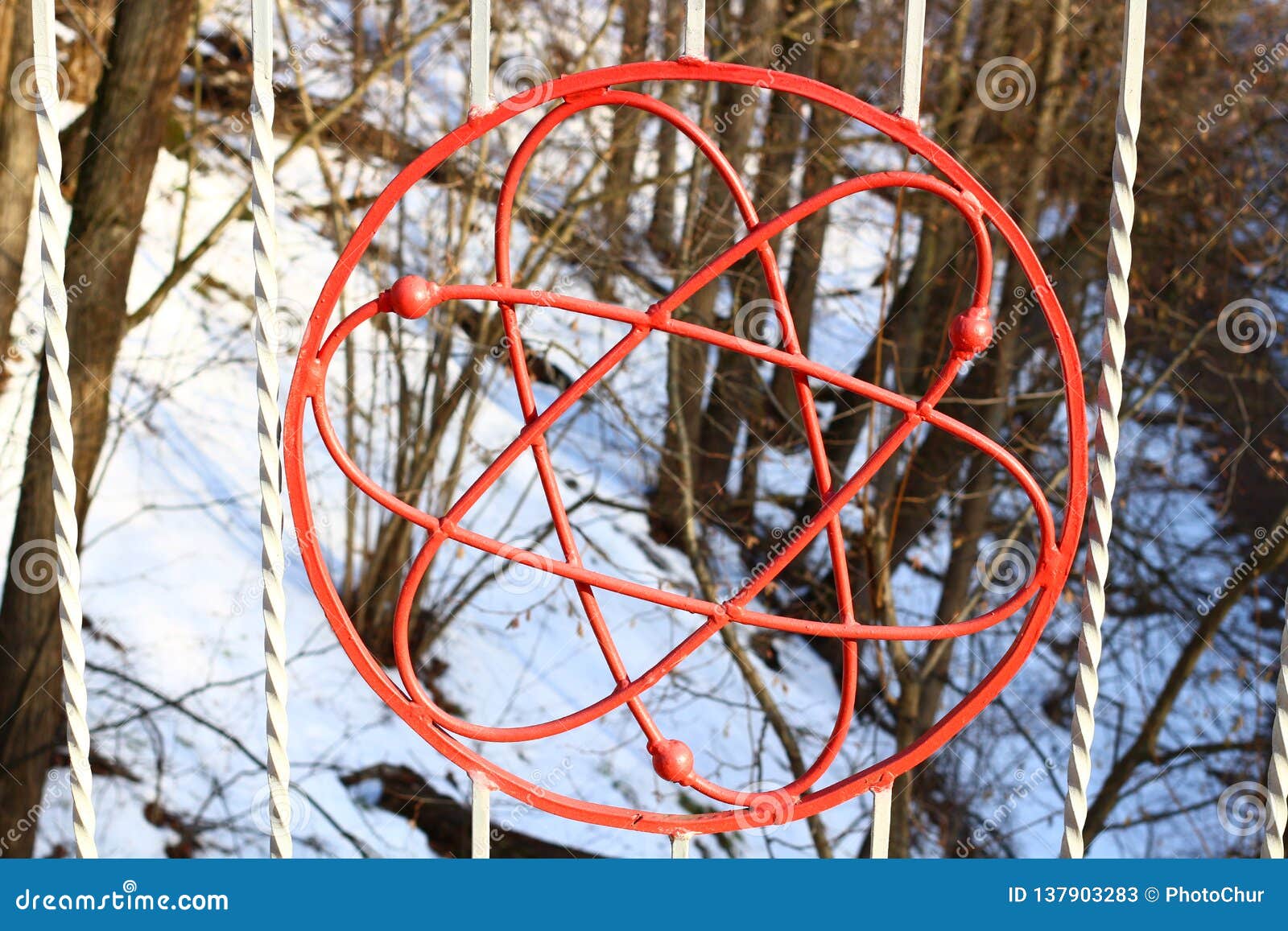 The Symbol of the Atom on the Fence Stock Image - Image of sign ...