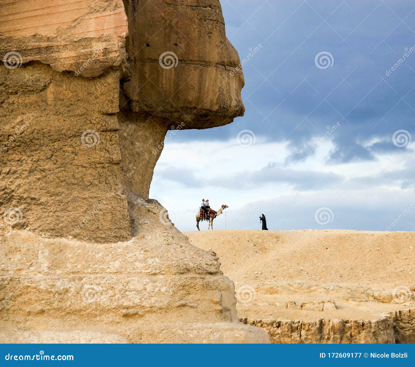 Symbol Egypt`s - Pyramid, Sphinx, Camel and Tourists in the Back ...