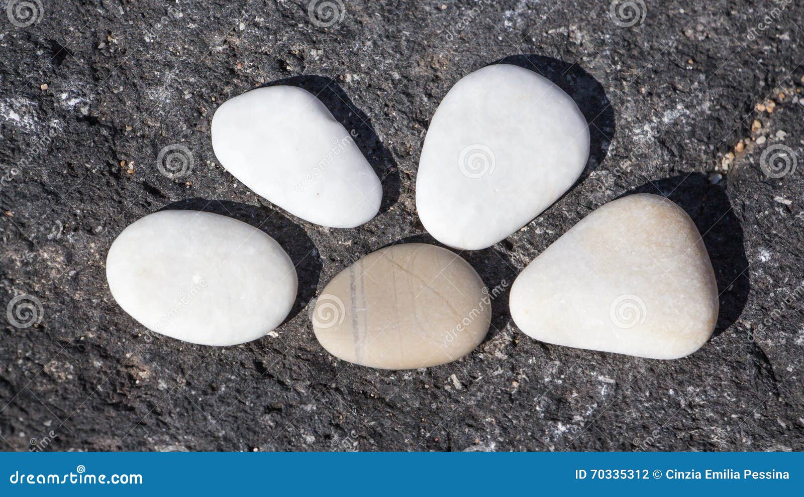 Symbol stock photo. Image of flower, stones, five, sunset - 70335312
