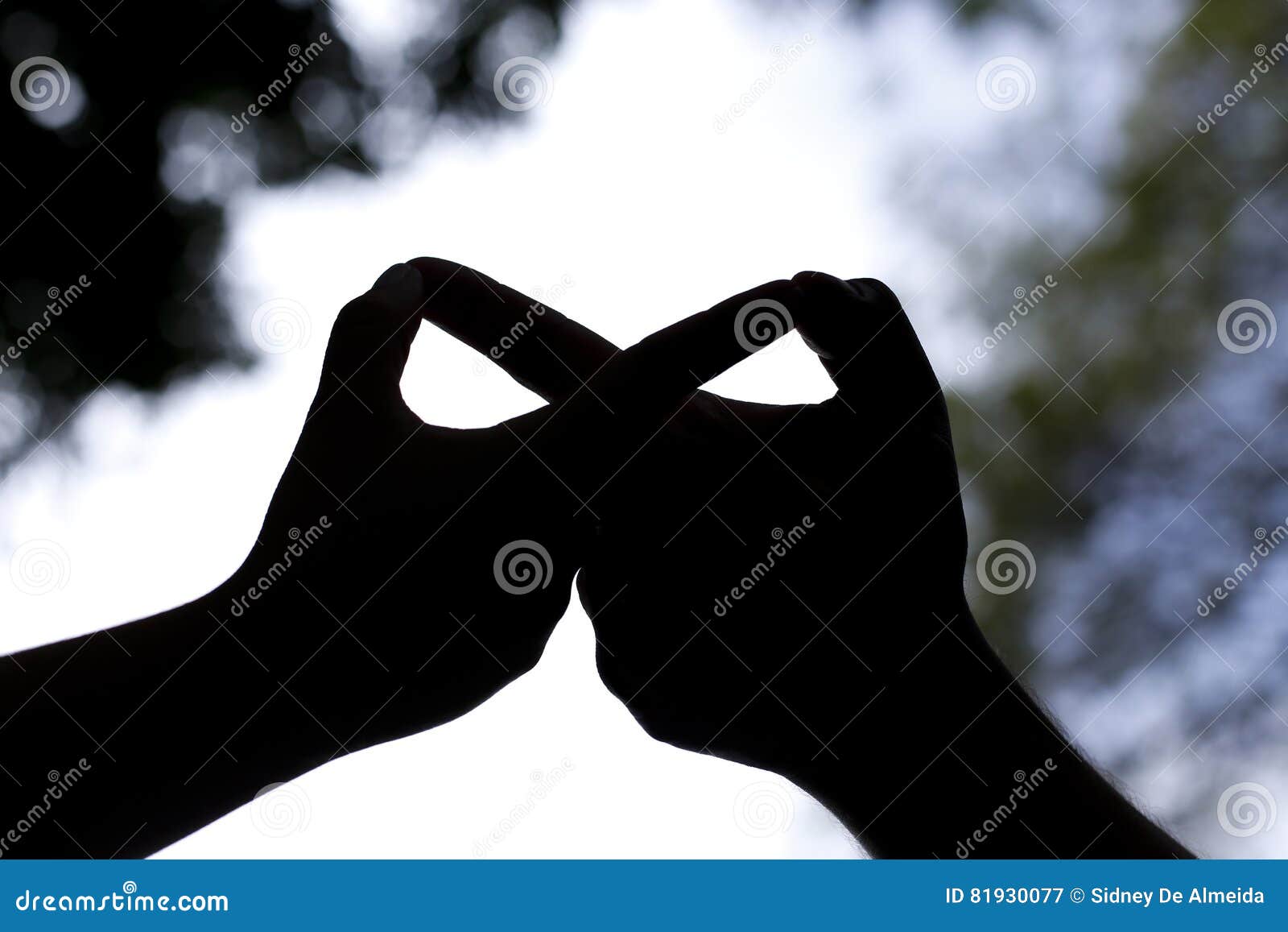 Symbol of Infinity with Hands Stock Image - Image of hands, backlight ...