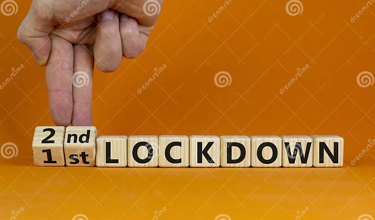 Symbol for a Second Lockdown. Hand Turns Cubes and Changes the ...