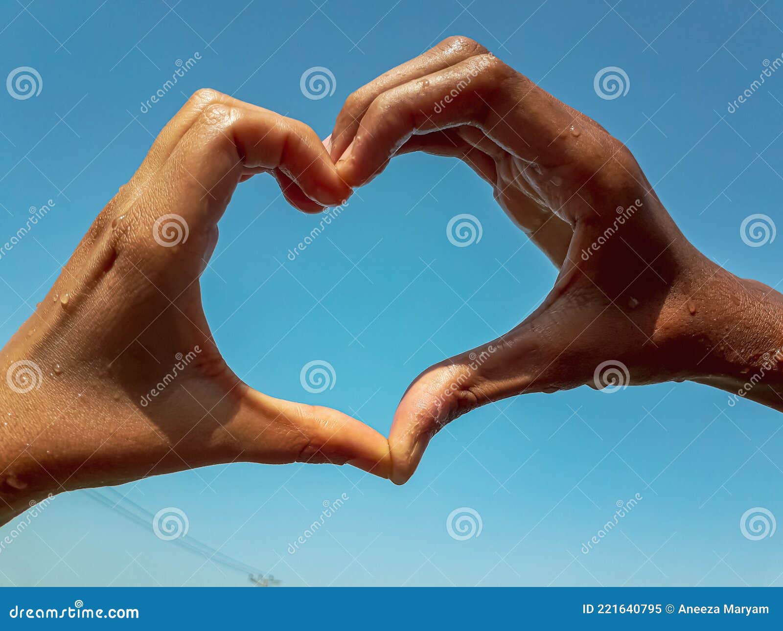 Symbol and Shape of Heart Created from Hands.the Concept of Unity ...