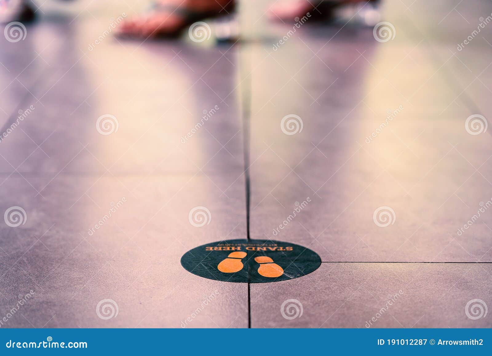 Symbol for Standing on Sign Saying Stand Here To Avoid Spread of ...