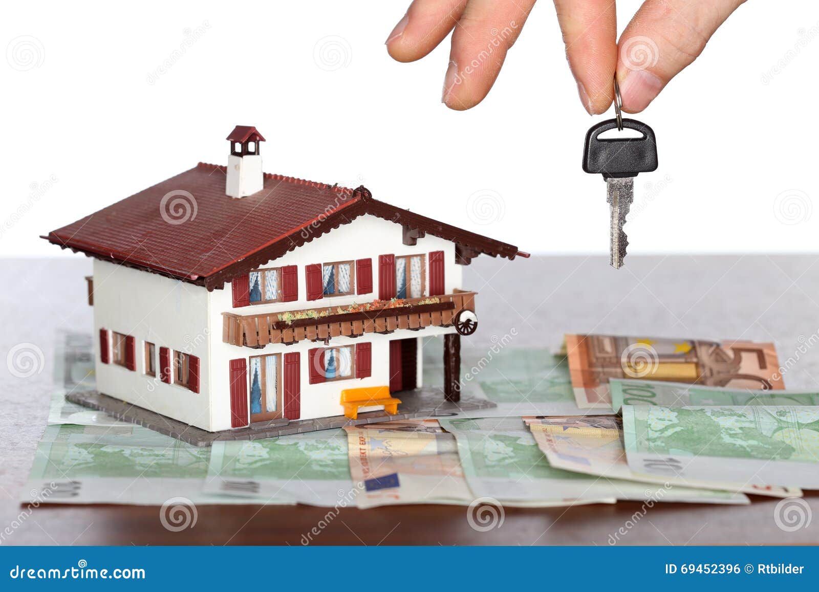 Symbolic key in hand stock photo. Image of color, house - 69452396