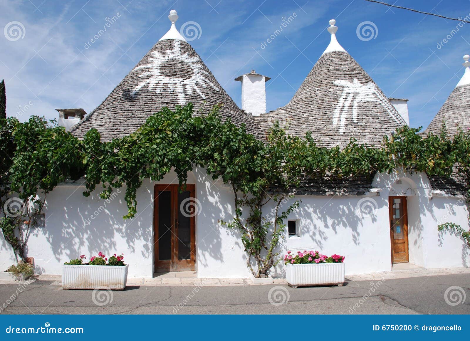 Symbols on Trulli Roofs, Puglia Stock Photo - Image of trullo, doors ...
