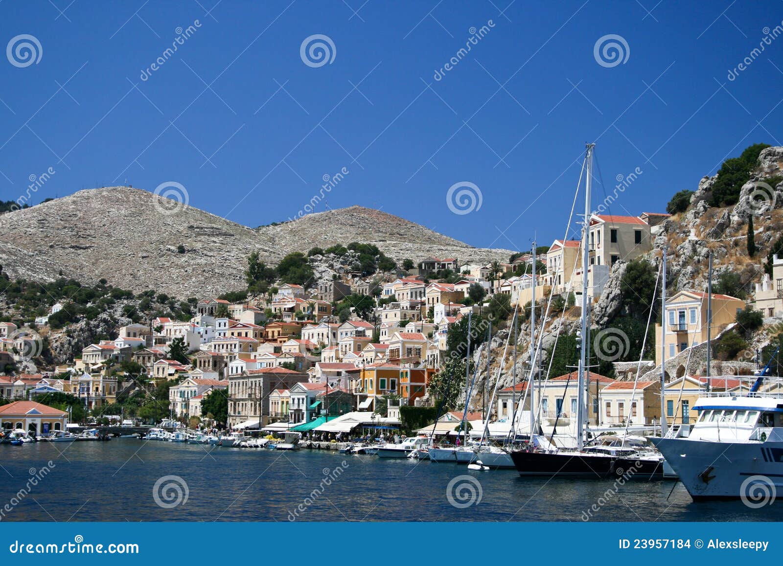 Symi bay stock photo. Image of hill, heath, architecture - 23957184