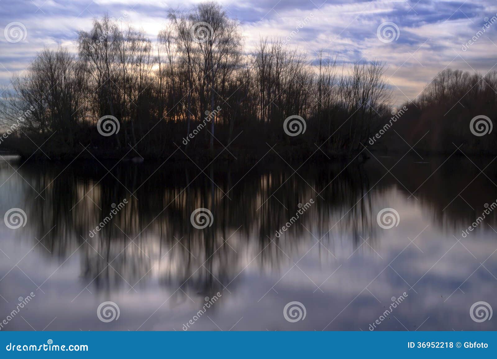 Symmetrical Reflections Landscape Stock Photo - Image of sunset, bare ...