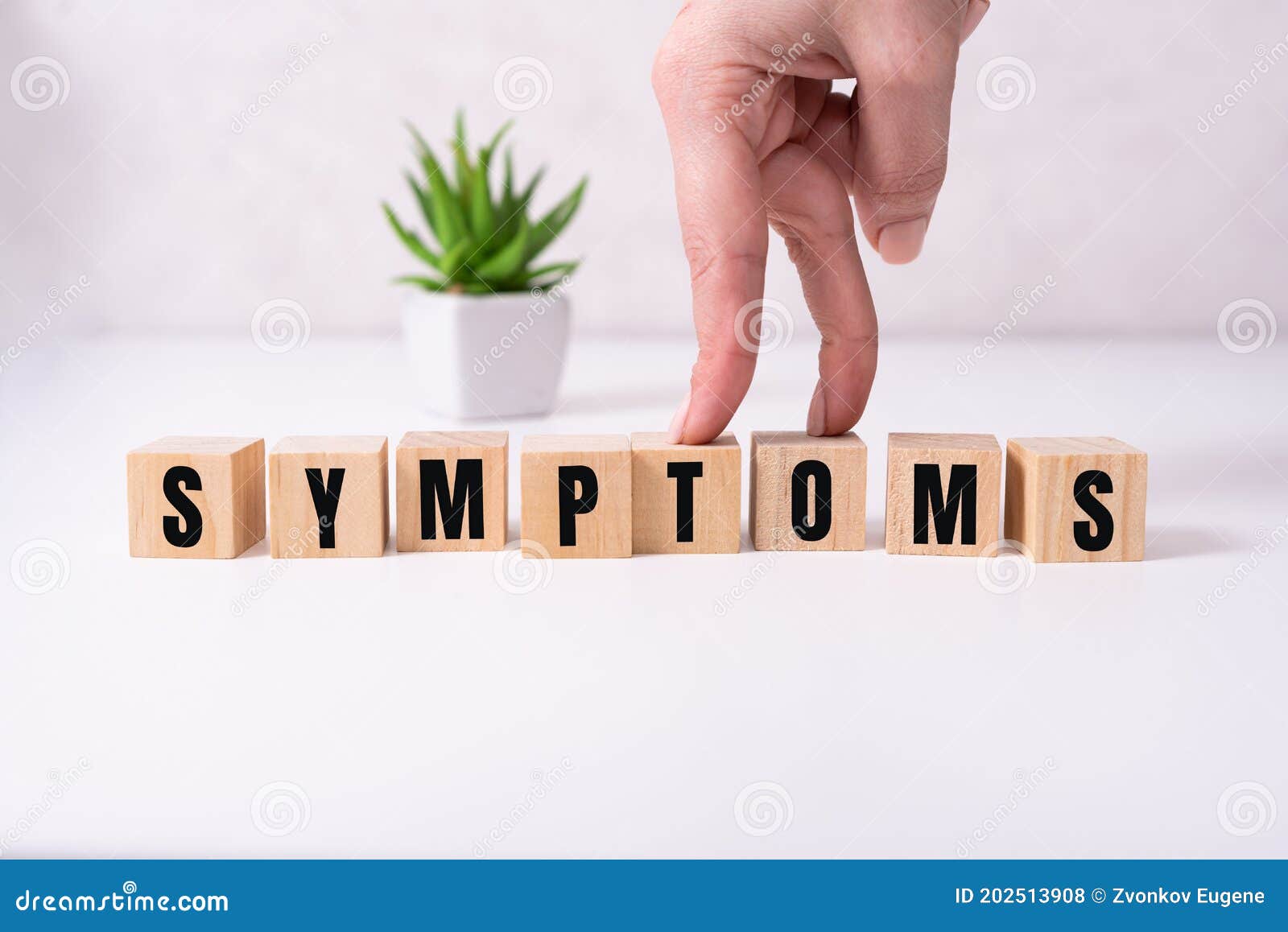 SYMPTOMS Text Word on Wooden Cubes on White Background. Stock Photo ...