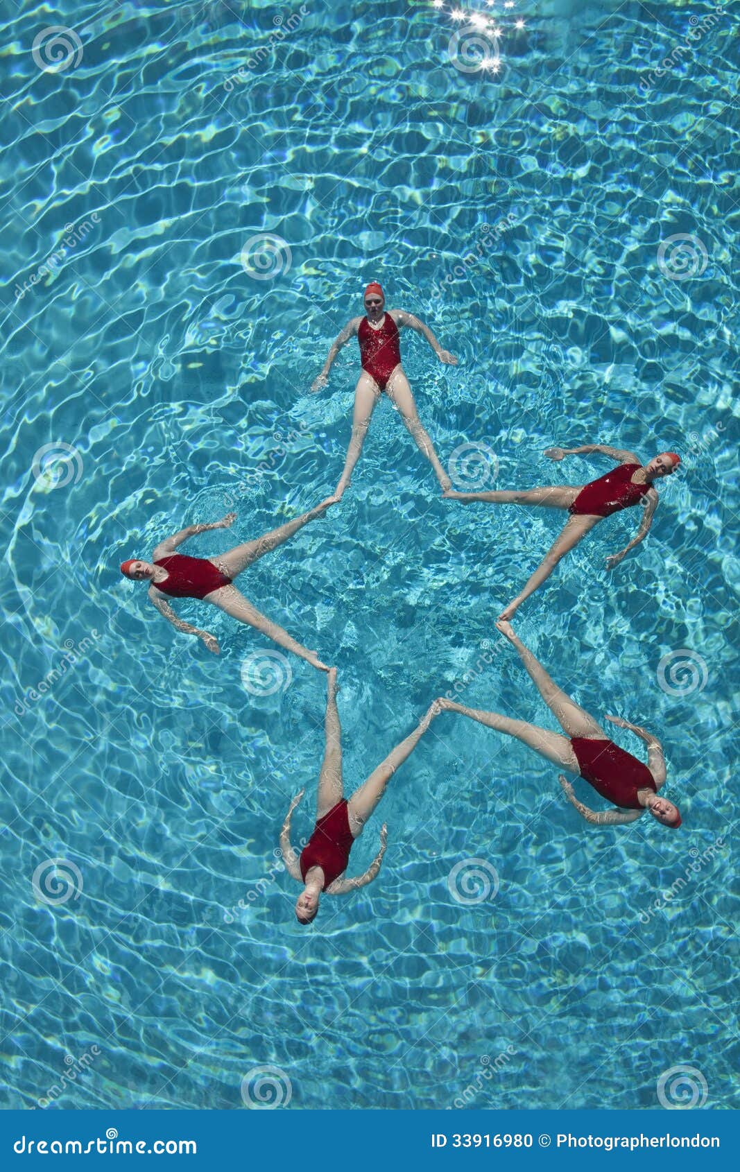 Synchronised Swimmers Forming a Star Shape Stock Photo - Image of full ...