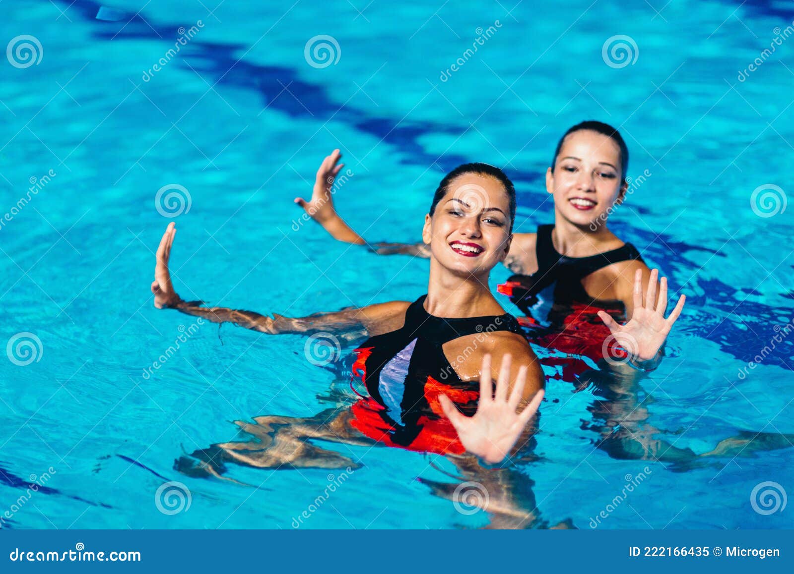 Synchronized Swimmers stock image. Image of people, color - 222166435