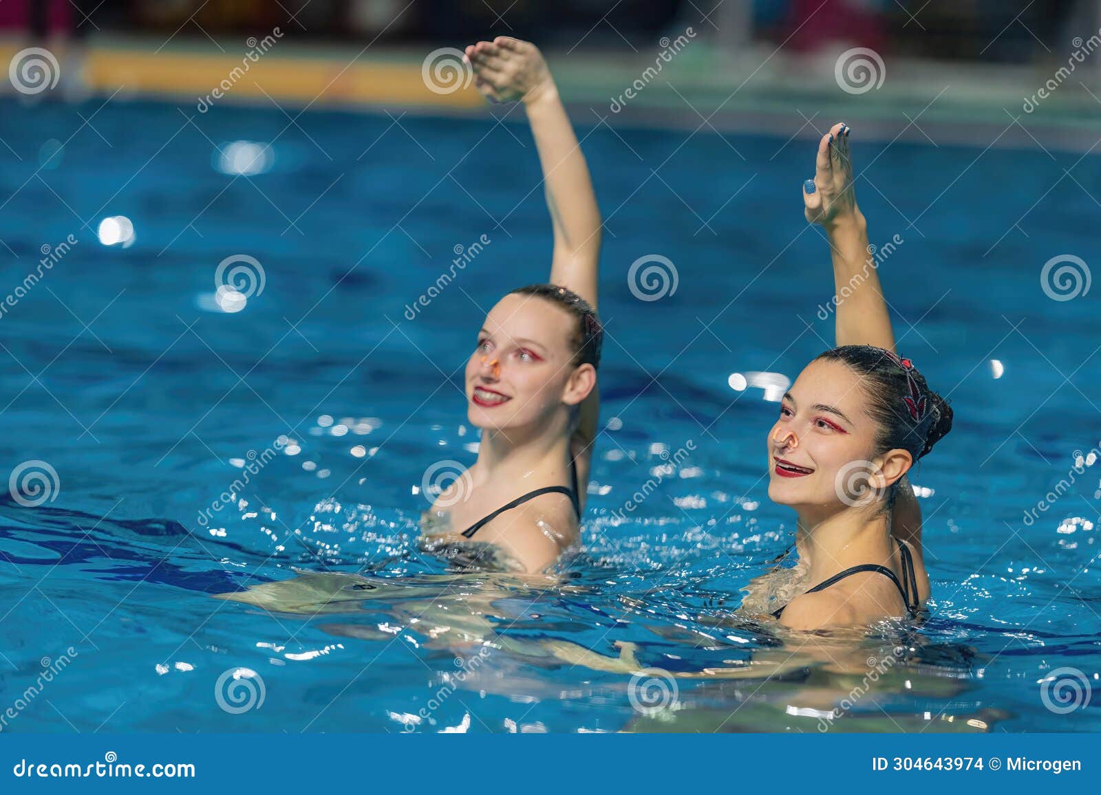 Synchronized Swimming Duet Dance. Synchronized Swimming Duet Enchants ...