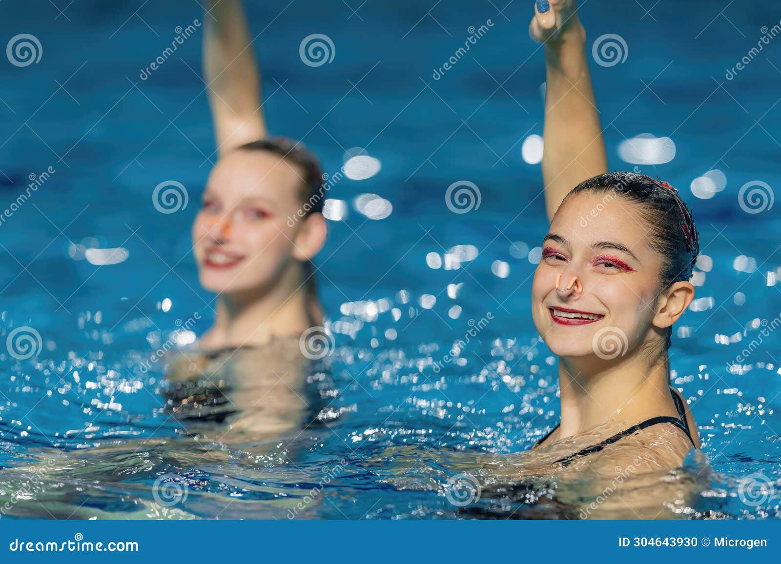 Synchronized Swimming Duet Dance. Synchronized Swimming Duet Enchants ...