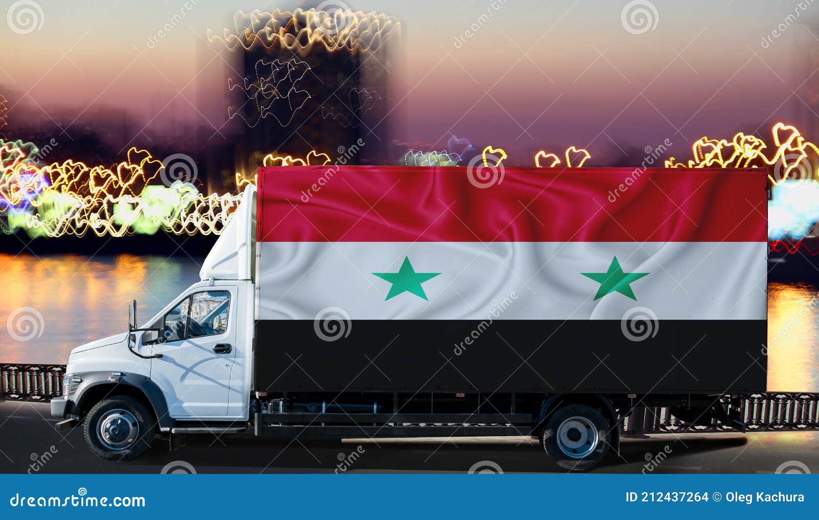 Syria Flag on the Side of a White Van Against the Backdrop of a Blurred ...