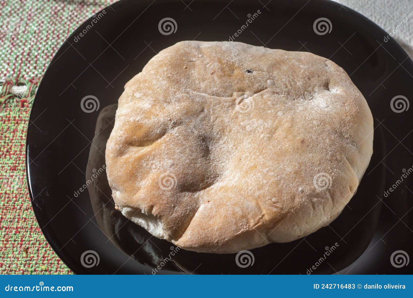 Syrian Bread on a Dish with Copy Space Left and Natural Light Stock ...