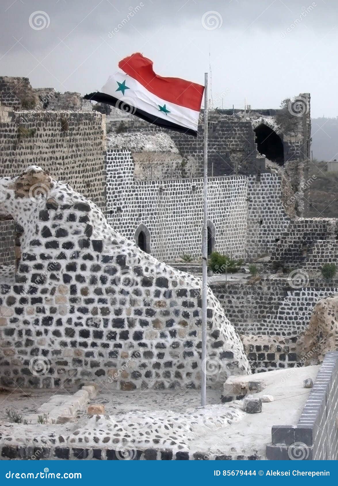 Syrian Flag on the Walls of the Castle Marqab is Fluttering in the Wind ...