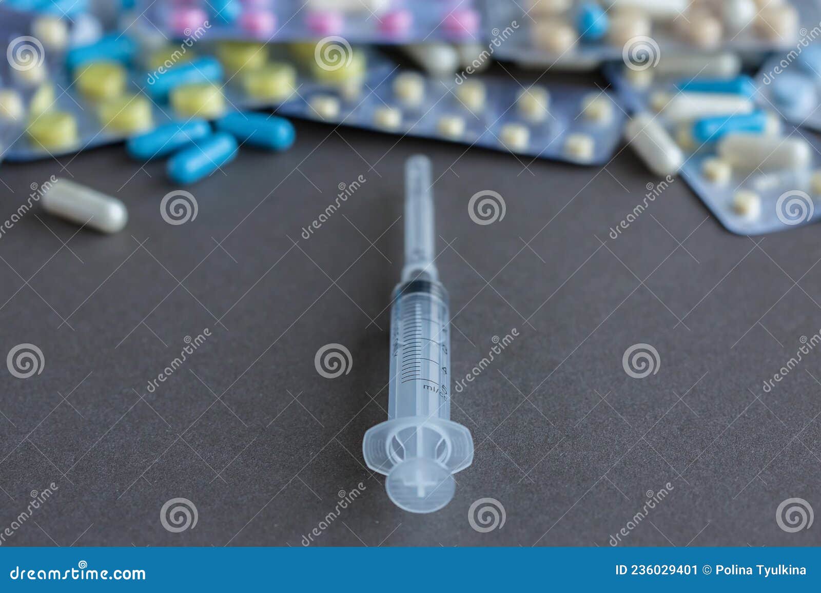 Syringe with Assorted Pharmaceutical Packaging of Tablets and Pills on ...