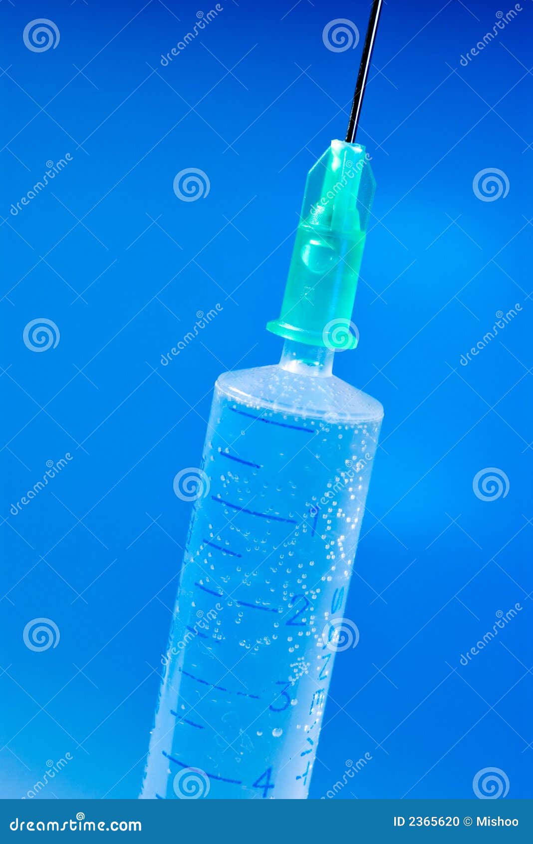 Syringe on blue stock photo. Image of antibiotic, drug - 2365620