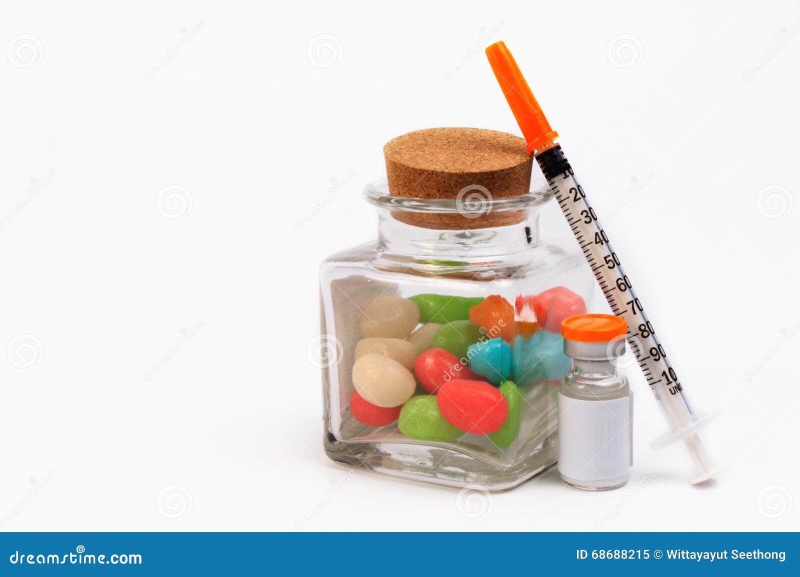 A Syringe and Candy Bottle Isolate on White Background. Stock Image ...