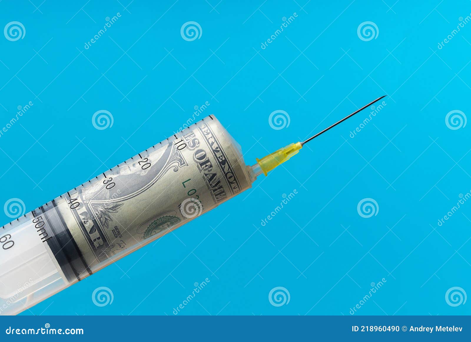 Syringe with a Dollar Inside on a Blue Background Stock Photo - Image ...