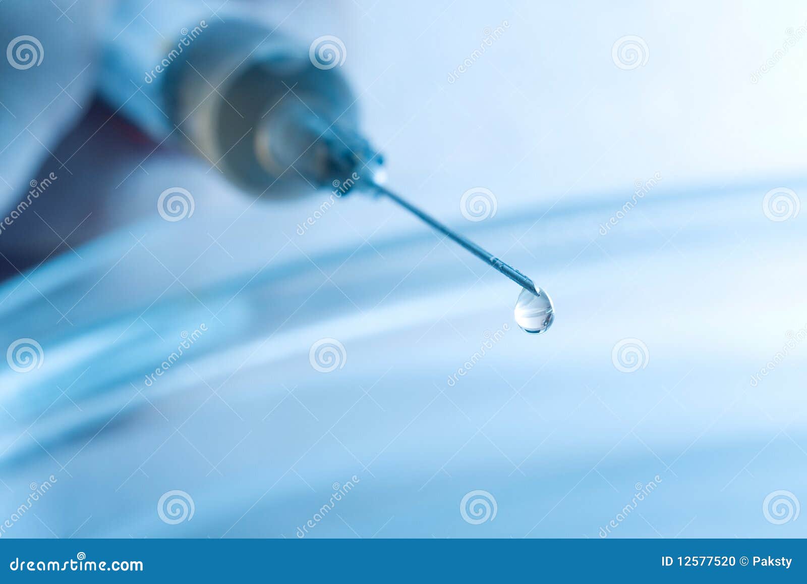 Syringe with a droplet stock photo. Image of drop, close - 12577520