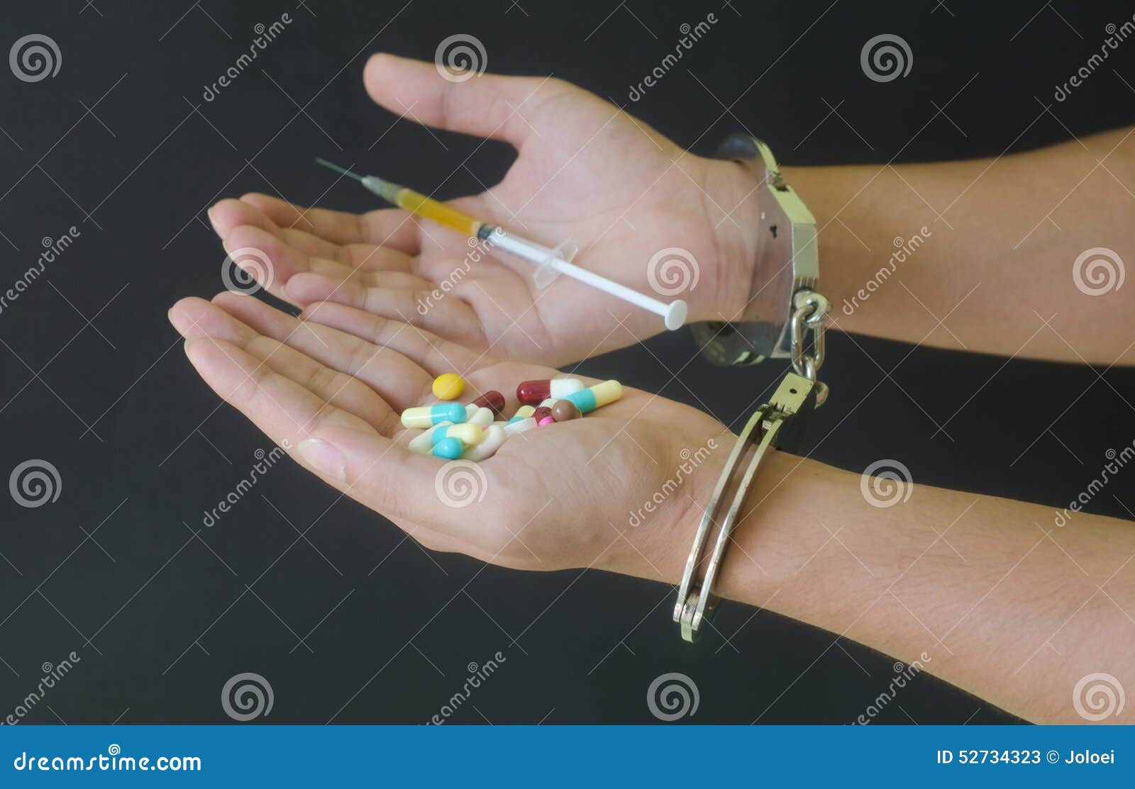 Syringe and drug in hand stock image. Image of junkie - 52734323