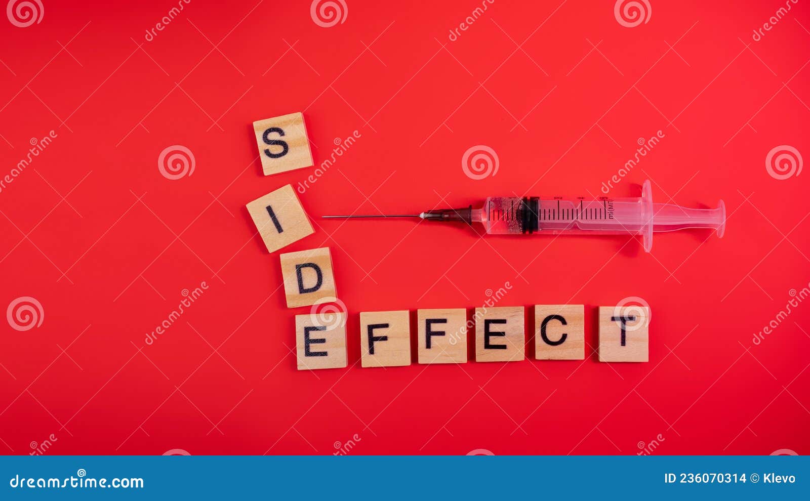 Syringe Filled with Solution. Words Side Effect on Colored Red Paper ...