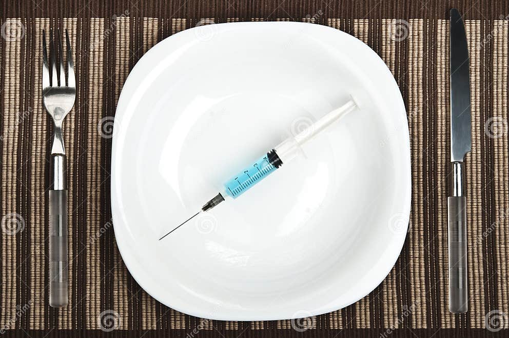 Syringe on food plate stock image. Image of white, object - 20532373