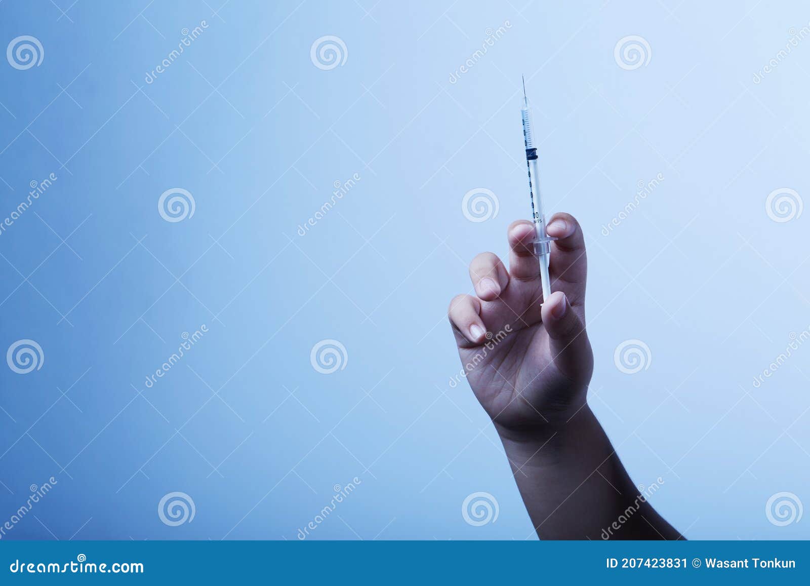Syringe in the hand stock image. Image of doctor, needle - 207423831