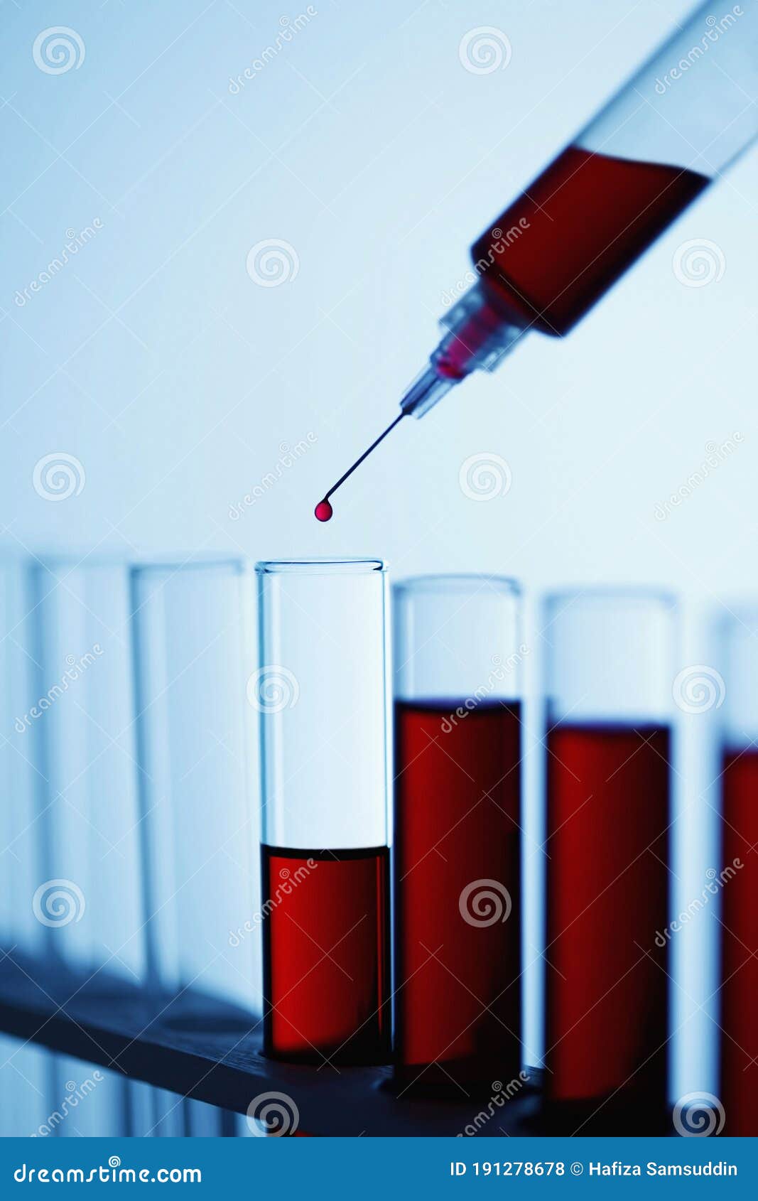 Syringe Injecting Liquid into Test Tubes. Decorative Background Design ...