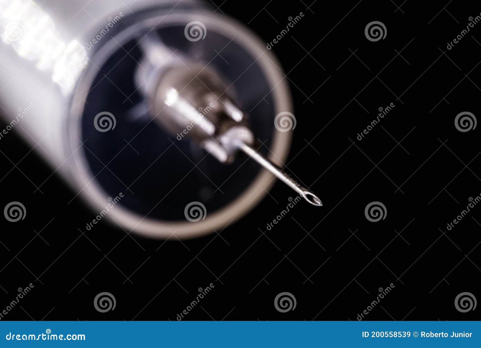 Syringe or Injection on Isolated Black Background, with Spot Focus on ...