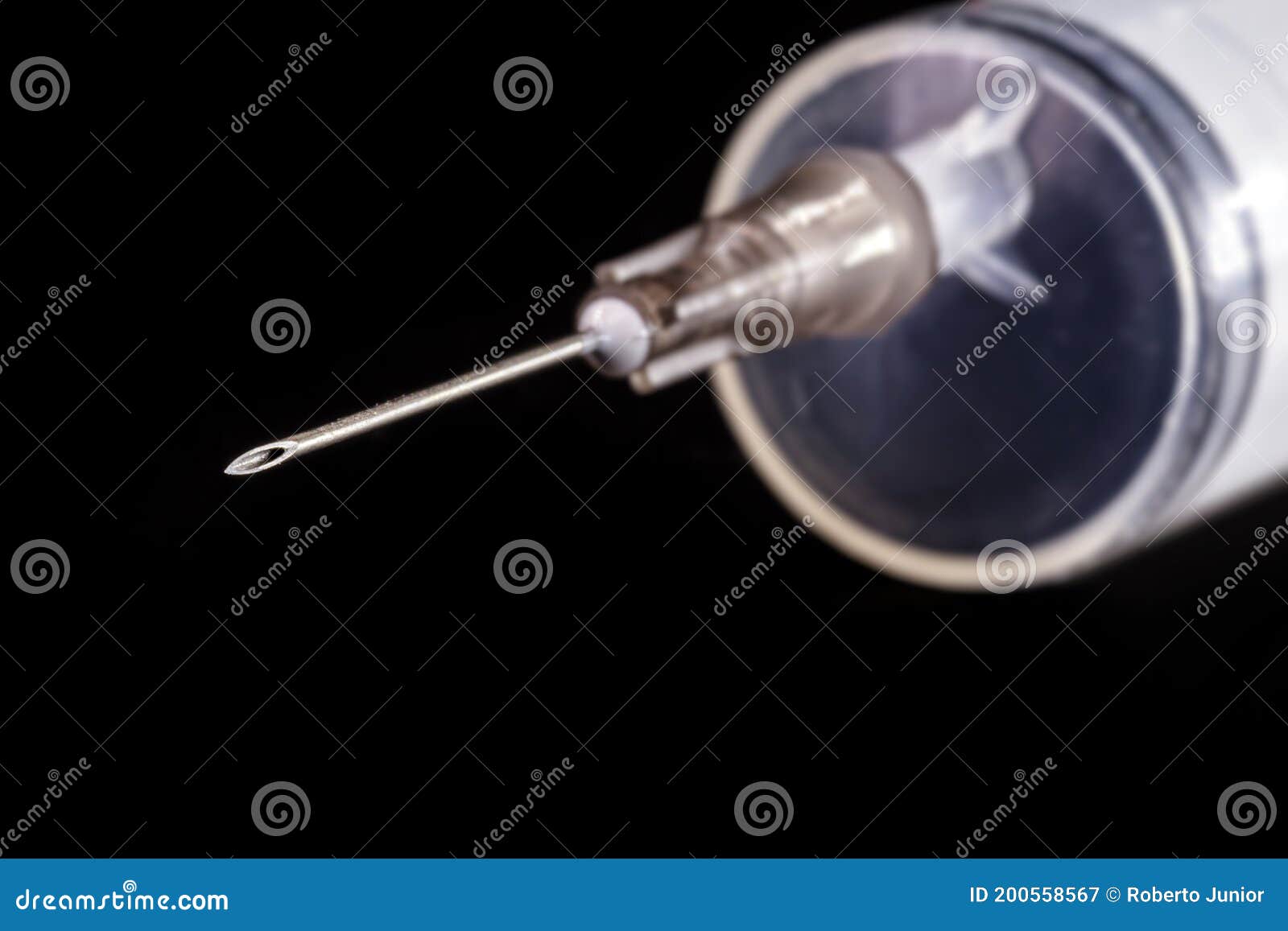 Syringe or Injection on Isolated Black Background, with Spot Focus on ...