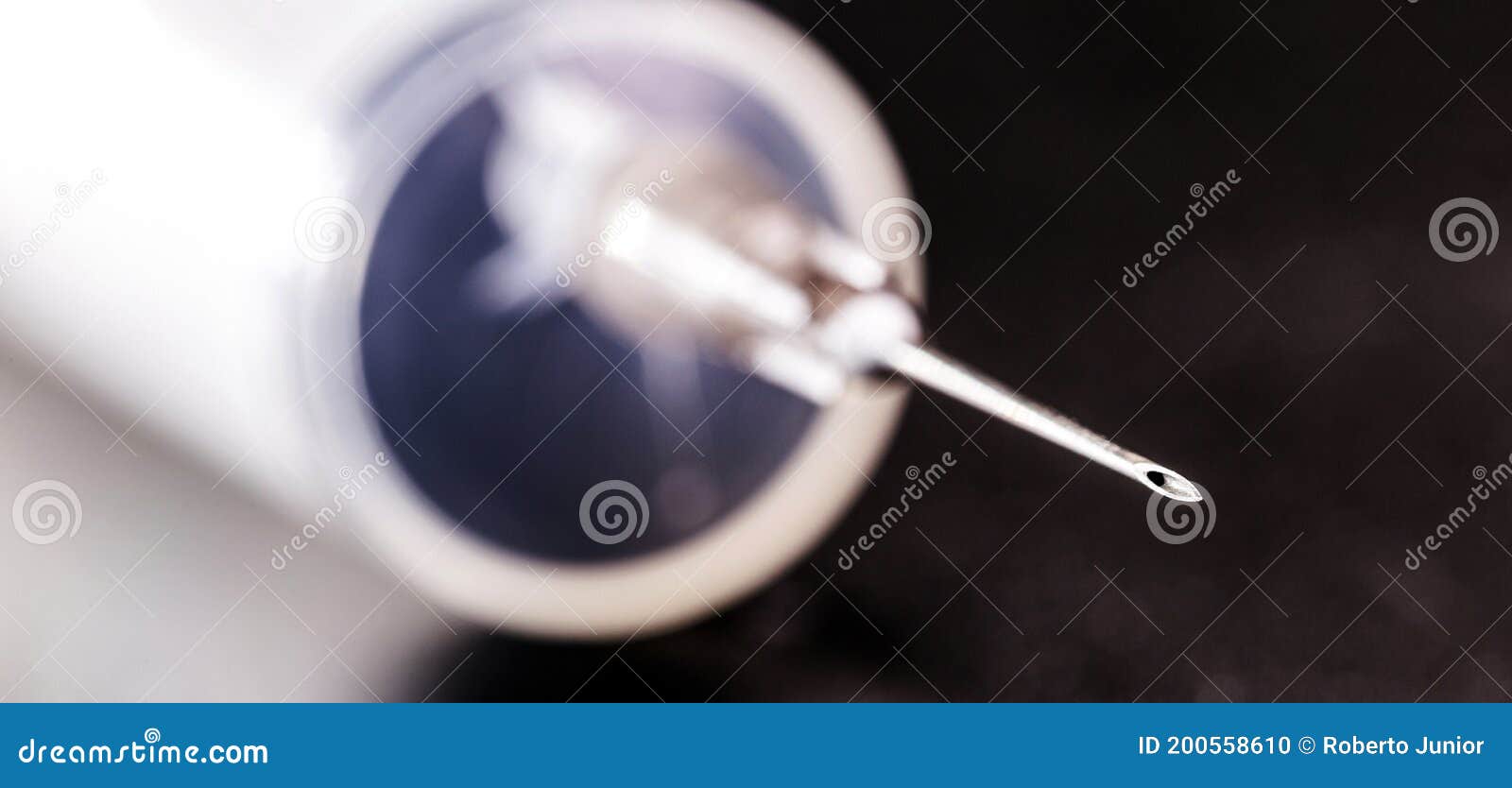 Syringe or Injection on Isolated Black Background, with Spot Focus on ...