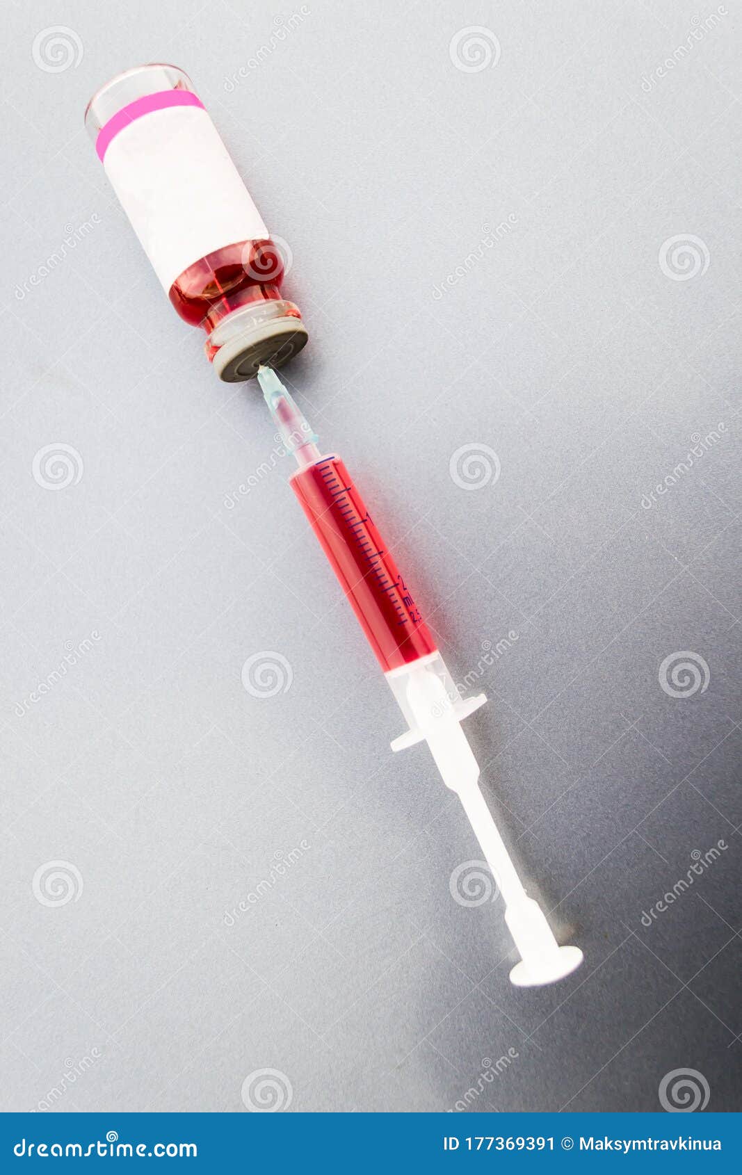 The Syringe is Inserted into the Can for Injection Stock Image - Image ...
