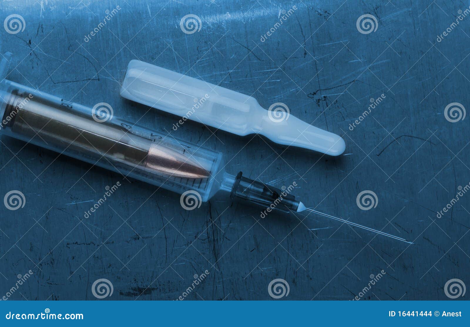 Syringe Loaded with Bullet, Blue Tint Stock Photo - Image of bullet ...