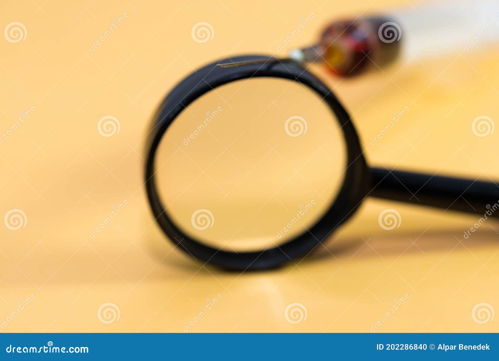 Syringe on Magnifying Glass Close Up Macro Shot Stock Photo - Image of ...