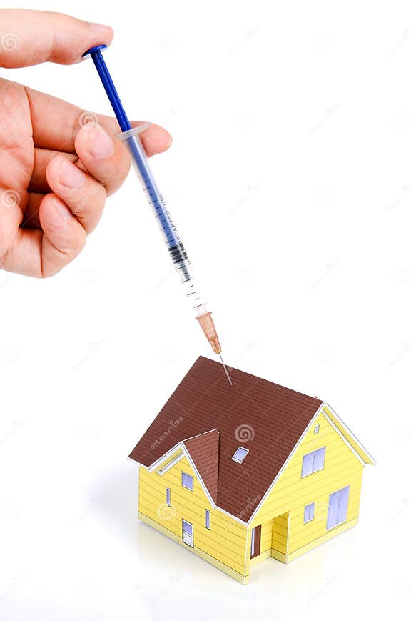 Syringe and model house stock photo. Image of ownership - 25249098