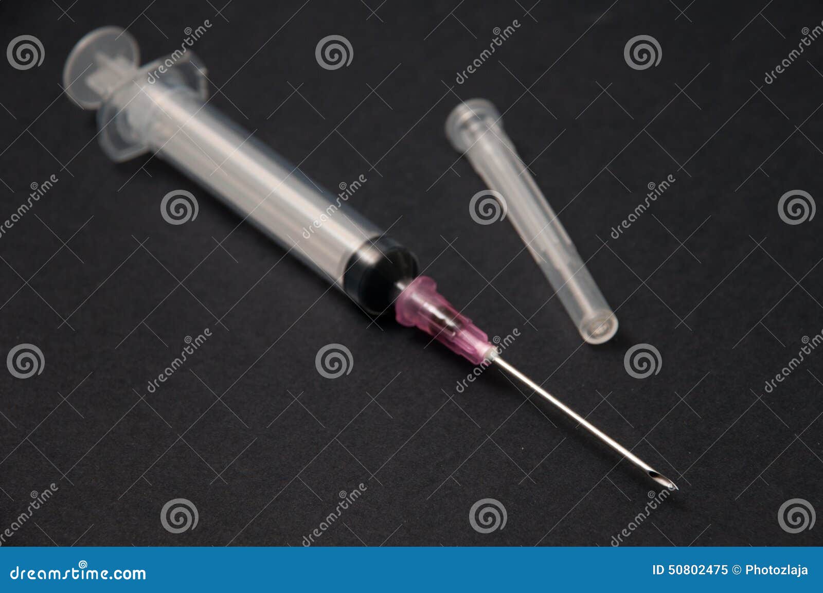 Syringe with a Needle on a Black Background Stock Image - Image of ...