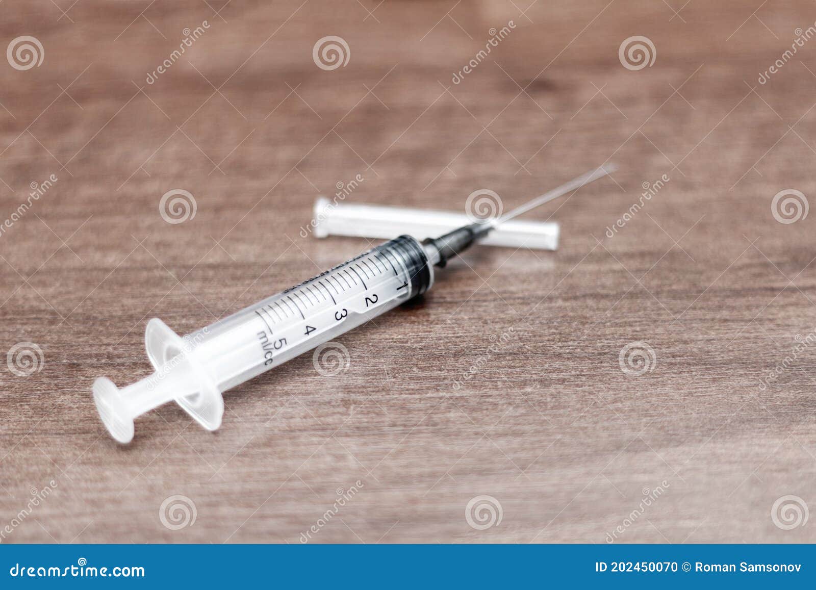 The Syringe with the Open Needle on the Table Stock Photo - Image of ...