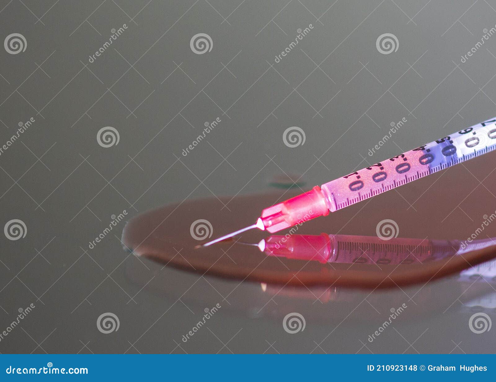 A Syringe with Red Fluid is Shown Stock Photo - Image of blood ...