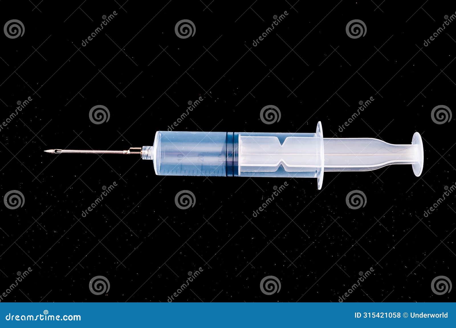 A Syringe is Shown in a Black Background Stock Photo - Image of ...