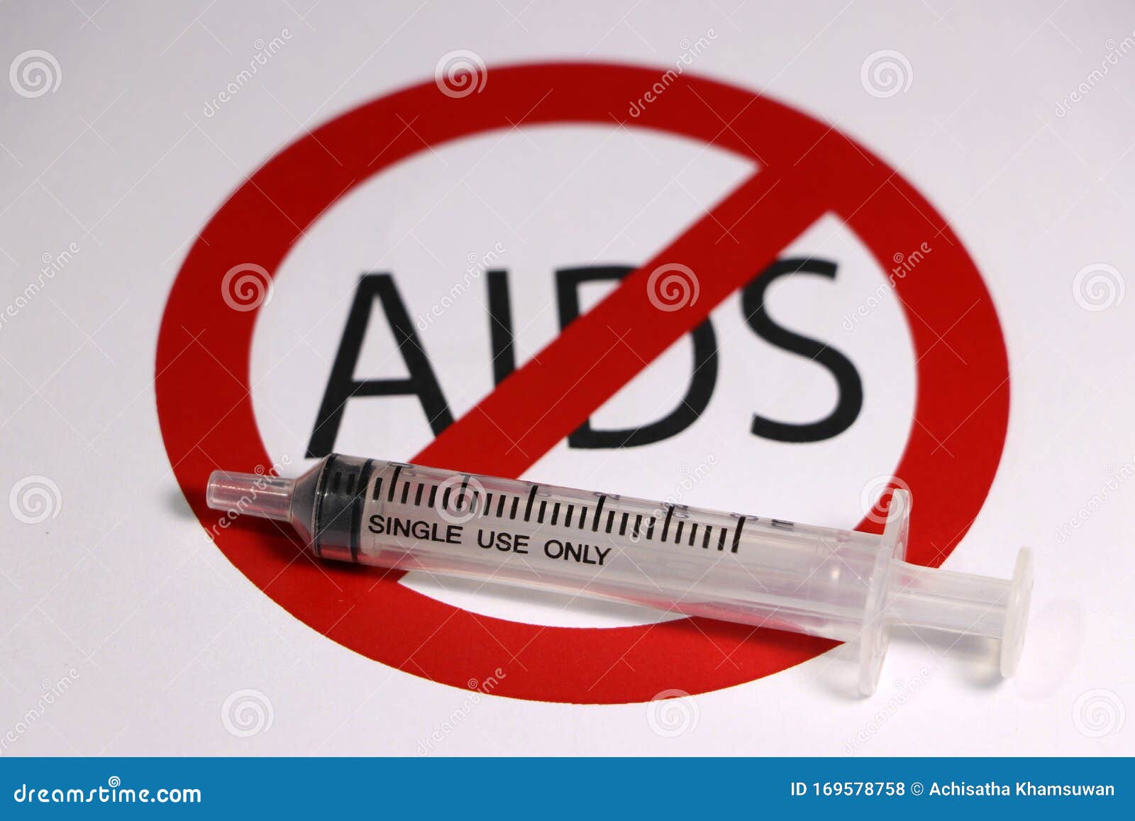 A Syringe on the Symbolic of Anti AIDS on White Background Stock Photo ...