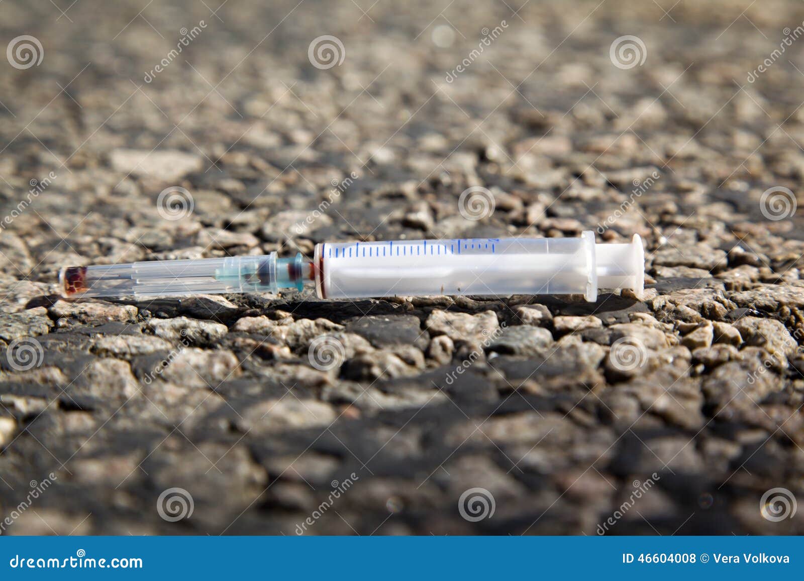 Syringe thrown out on road stock photo. Image of sharp - 46604008
