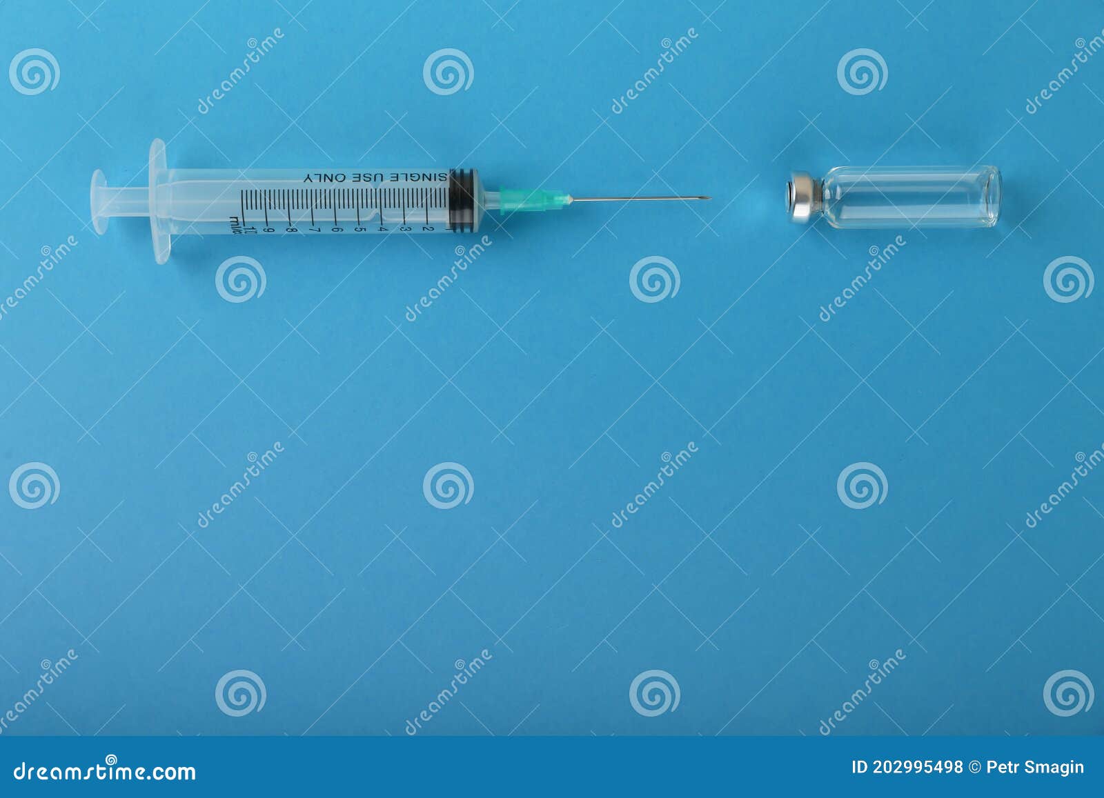 Syringe and Vial on Blue Background Stock Photo - Image of injection ...