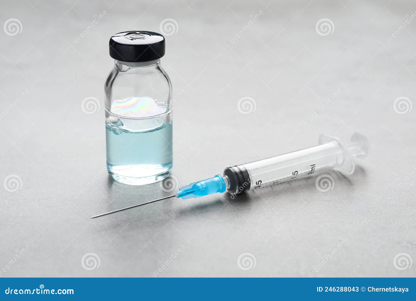 Syringe and Vial on Grey Table. Medical Anesthesia Stock Image - Image ...